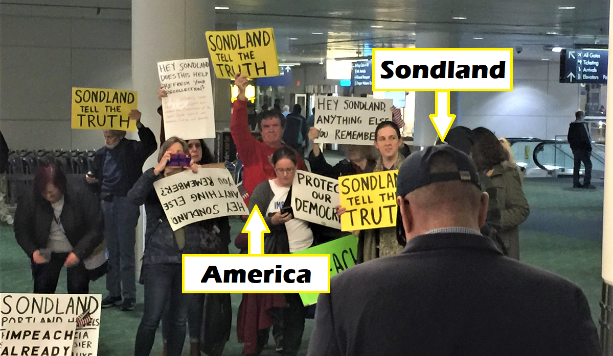 AWKWARD: Watch Protesters School Sondland at PDX Baggage Claim